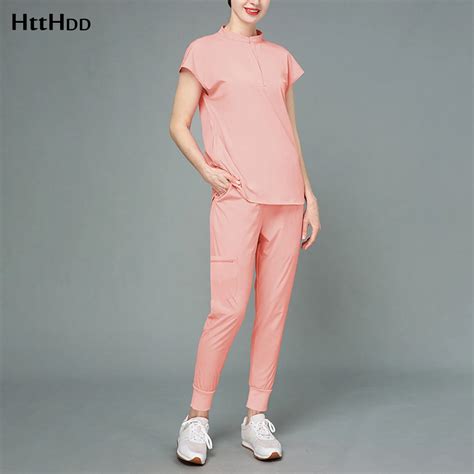 여자의 새로운 약사 연구소 스파 정장 간호사 의사 의료 유니폼 고품질의 도매 수술 수술 가운 미용사 유니폼스크럽 세트 Aliexpress