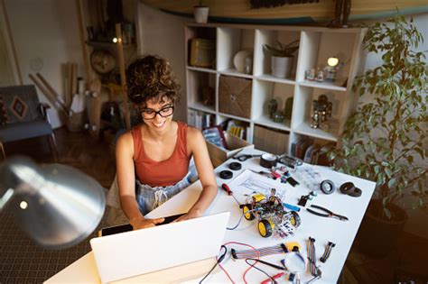 Excited Female Programmer Using Opensource Hardware And Software