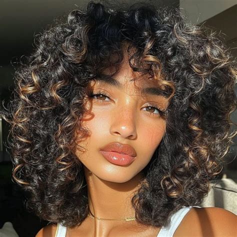 37 Shoulder Length Curly Hairstyles With Layers Layered Black Curls With Golden Highlights