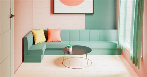 소파가 있고 벽에 그림이 있는 거실 사진 Unsplash의 화려한 인테리어 이미지