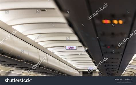 Exit Sign Passenger Airplane Emergency Exit Stock Photo