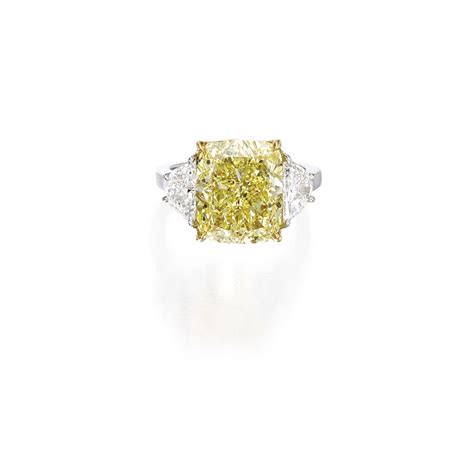 328 Platinum 18 Karat Gold Fancy Intense Yellow Diamond And