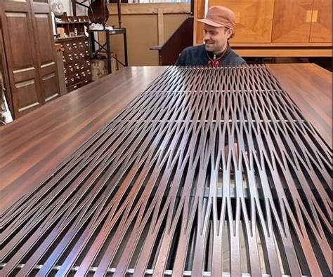 This Dining Table Expands To Seat More With The Turn Of A Crank