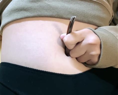 Knife In Navel From Multiple Angles