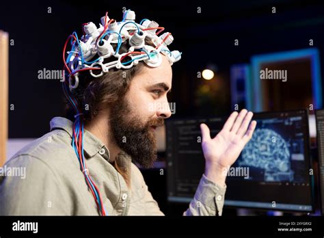 Smiling Software Technician Using Eeg Headset To Upload Consciousness Into Computer Happy It