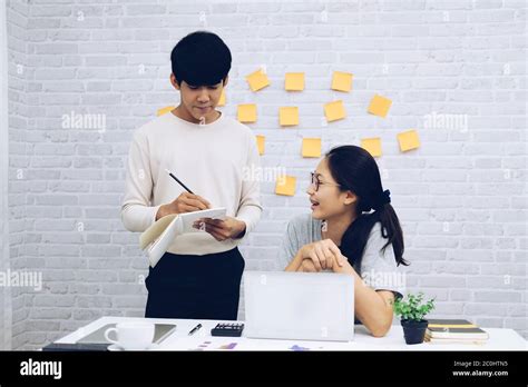 Man Woman Colleagues Analyzing Data On Computer Startup Teamwork Coworking Team Working At Home