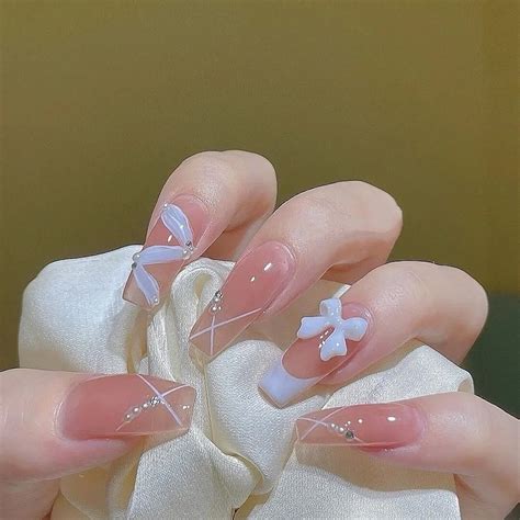 Kiểu Nail Nơ Xinh Đẹp Cho Phong Cách Nàng Thơ Tiki