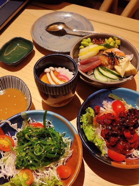 Premium Photo A Table Of Bowls Japanese Cuisine