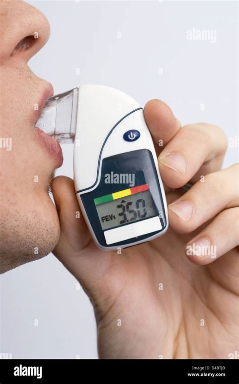 Close Up Man Using Digital Peak Flow Meter Hi Res Stock Photography And Images Alamy