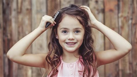 Premium Photo Beautiful Girl Brushing Her Hair