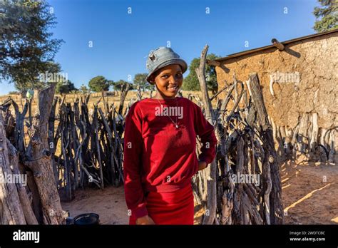 Village African Girl Standing In Front Of The Outdoors Kitchen In The