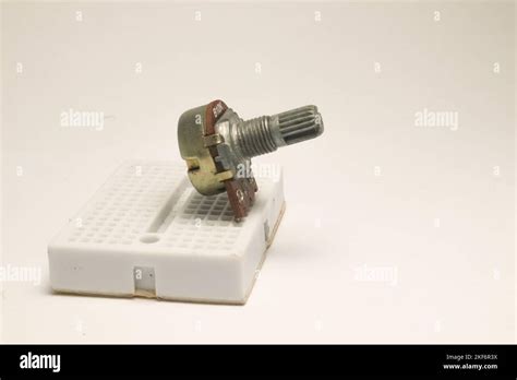 A Variable Resistor Or Potentiometer With Code B10k Stuck On A Small Project Board Side View On