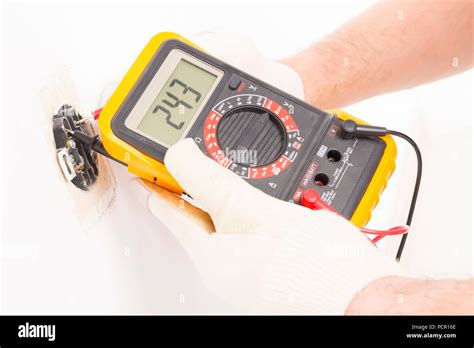Electrician Checking Socket Voltage With Digital Multimeter Stock Photo Alamy