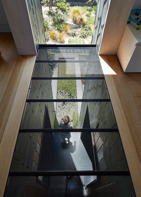 Diamond Scalloped And Brick Shaped Shingles Cover Melbourne House By