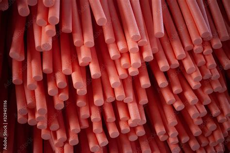 Abstract Background Of Paralon Tubes Texture Of Red Paralon Cylinders