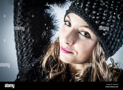 Creative Studio Portrait Of A Beautiful Brunette Girl Wearing A Stylish