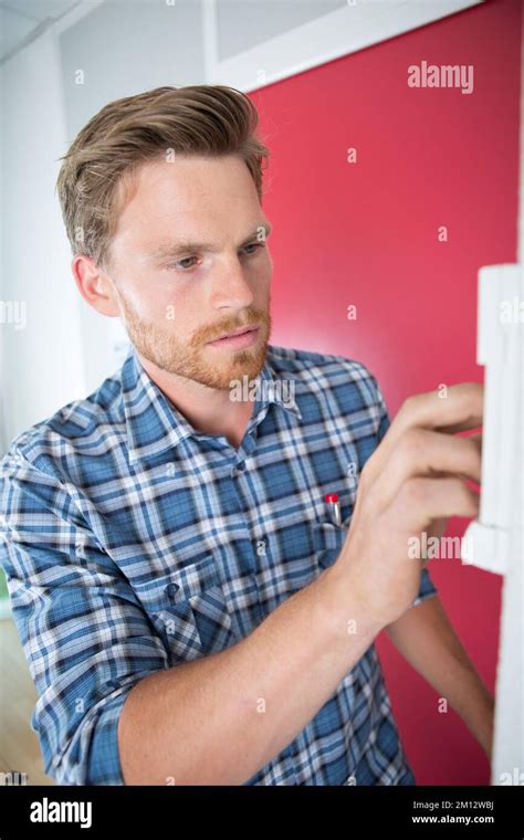Man Pressing His Combination Pin On The Locking Device Stock Photo Alamy