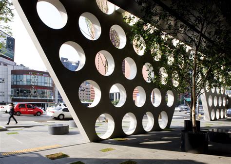 Archiums Urban Hive Tower Has Perforated Facade Modelled On Honeycomb