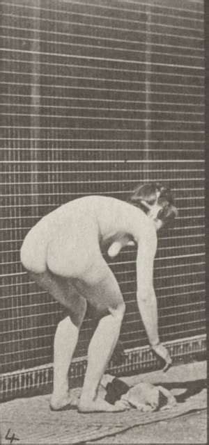Nude Woman Lifting A Cloth From The Ground Placing Around Shoulder And Turning Rbm QP M