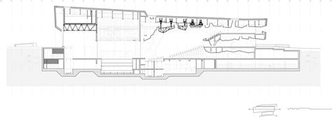 fernando menis cavernous concert hall in poland uses crushed brickwork