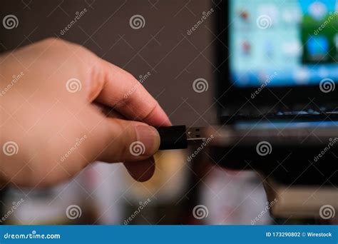 Person Plugging A Usb Cable Into The Port Of A Laptop Stock Photo Image Of Backup