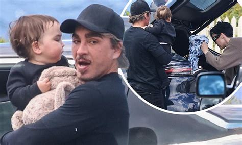 John Ibrahim Is Every Inch The Doting Father As He Cuddles Son Elvis Daily Mail Online