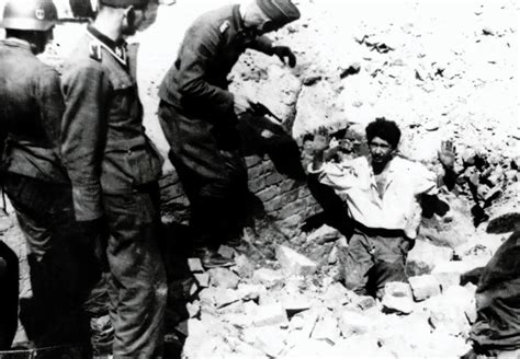 Waffen Ss Force A Jewish Man From His Bunker During The Warsaw Ghetto Uprising 9 May 1943 1168