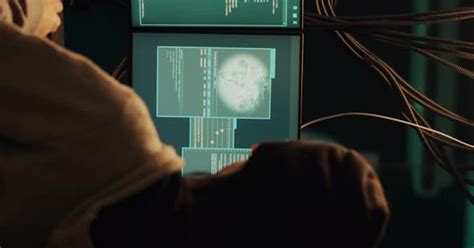 Vertical Video Skilled Male Hacker Exploiting System Vulnerability And Breaking Into Firewall