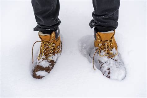 Man Walking In Snowy Weather Wearing Boots And Warm Clothes B Stock Photo Image Of Shoes