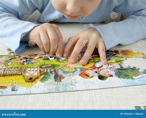 Puzzle Assembling Stock Image Image Of Assembling Mosaic 1903635 Puzzle Assembling Stock Image Image Of Assembling Mosaic 1903635