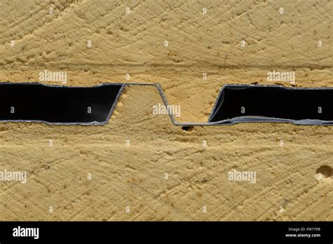 Background Of Plastic Foam Cladding On A Building Site Sandwiched Between Layers Of Colour