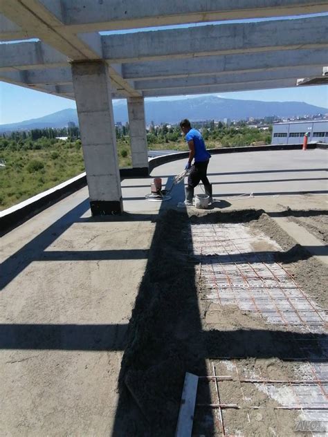 Циментова подова замазка Строителни услуги София машинни подови замазки замазки върху