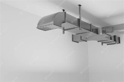 빈 방의 천장에 있는 산업용 에어컨 시스템 Hvac 파이프 3d 렌더링 그림 프리미엄 사진
