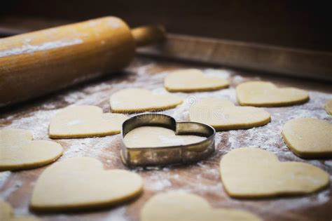 Christmas Baking Cookie Dough Cookie Cutters And Rolling Pin On