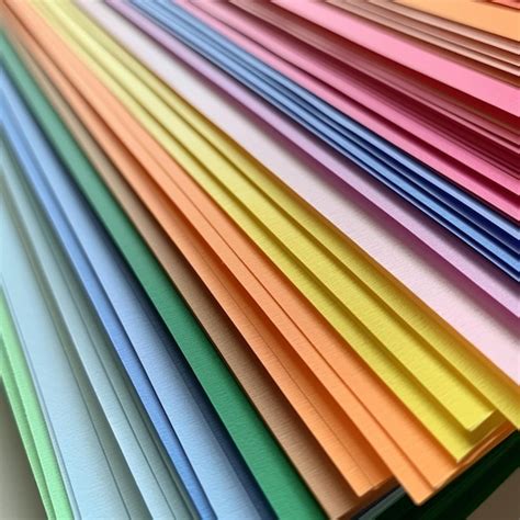 A Stack Of Rainbow Colored Folders With One That Has A Rainbow Colored Strip Premium Ai