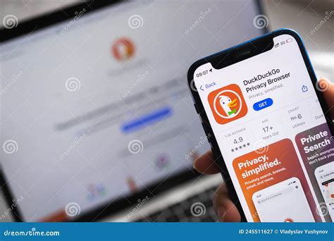 DuckDuckGo App On A Smartphone Screen Next To Google Search Page Concept For Competition