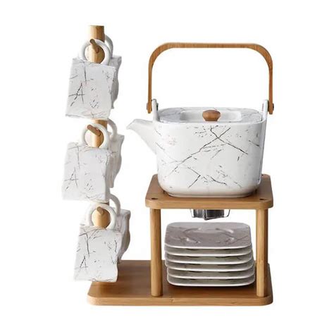 Фарфоровий чайник зі свічковим підігрівом на 6 персон колір білий мармур купити за низькою ціною