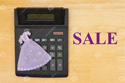 Sale Message With A Calculator And A Fancy Purple Dress Stock Image