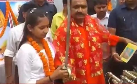 Act Against Evildoers Bjp Mla Distributes Swords Among Girls In Bihar