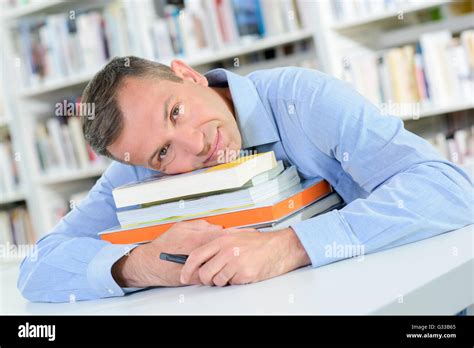 Man With Books Stock Photo Alamy