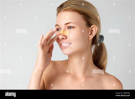 Beautiful Young Girl With Plaster On Nose After Rhinoplasty Surgery