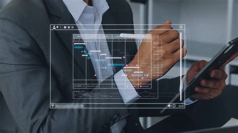 Project Manager Working With Gantt Chart Schedule To Plan Tasks And