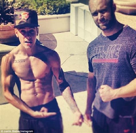 Justin Bieber Flexing Biceps