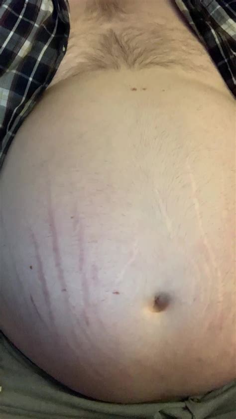 Bloated Fat Guy Chugs A Beer Into His Big Belly