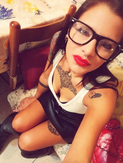 Premium Photo High Angle Portrait Of Sensuous Woman Sitting On Chair