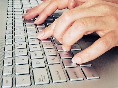 Premium Photo Close Up Of Hands Typing Laptop Keyboard