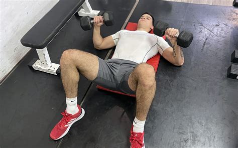 Dumbbell Floor Press Build Chest Arms And Shoulders Effectively