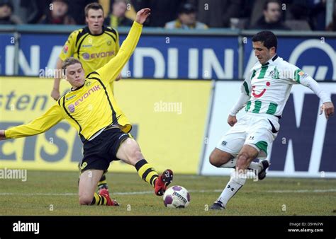 Dortmunds Lars Bender L Tries To Block The Shot By Hanovers Altin Lala During German