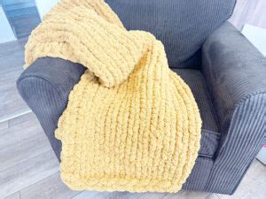How To Make A Yarn Blanket No Needles Needed Craft Projects For Adults