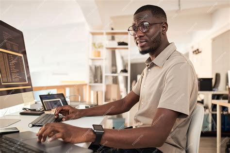 Premium Photo Portrait Of Black Devops Engineer Testing And Examining